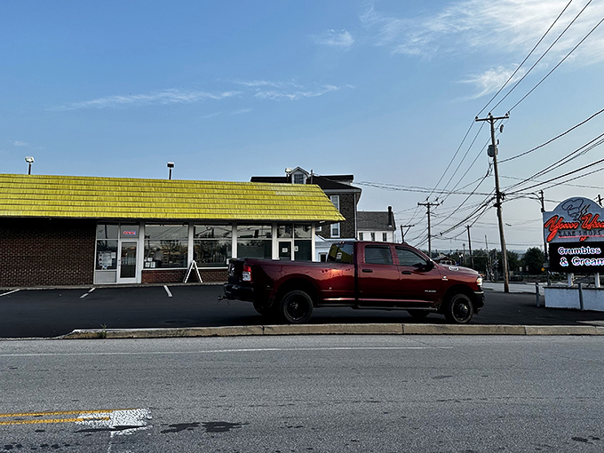 The unmistakable yellow roof of Yum Yum Bake Shops stands like a beacon of sugary hope along Bethlehem Pike in Colmar.