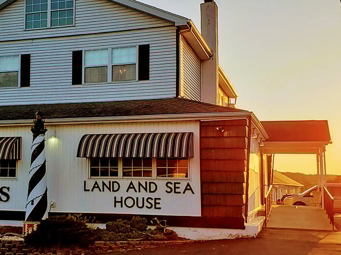 The golden sunset bathes Beck's Land & Sea House in warm light, its lighthouse-inspired exterior promising maritime delights in the heart of Pennsylvania's rolling countryside.