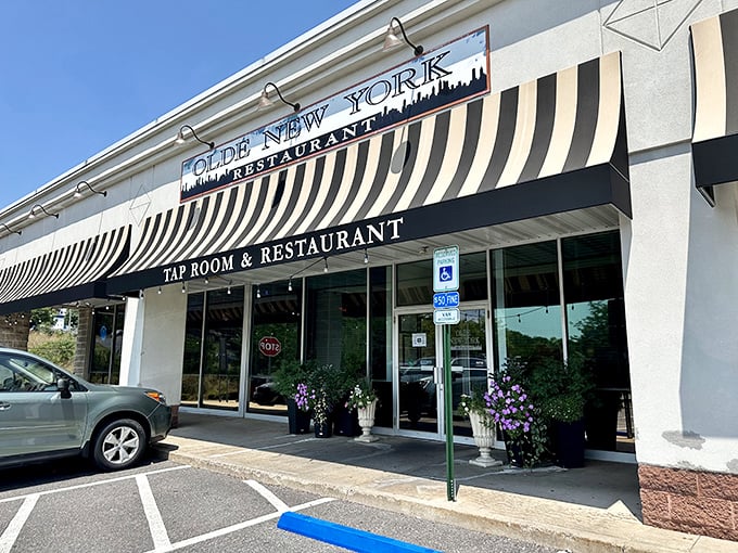The classic striped awning and vintage signage of Olde New York isn't just inviting—it's practically waving you in for pierogies and good times.