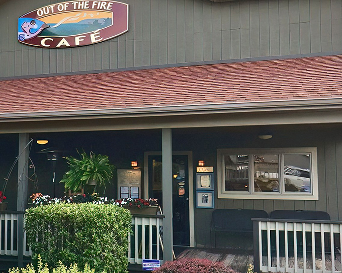 The sage-green exterior of Out of the Fire Café welcomes you like an old friend, promising culinary adventures that live up to its fiery name.