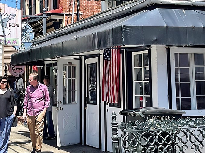 New Hope's charming streets set the perfect stage for ice cream adventures, with Moo Hope's sign promising sweet relief from Pennsylvania summer heat.