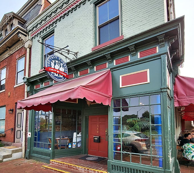 The mint-green facade with vibrant red awnings isn't just charming—it's a portal to Havana hiding in plain sight on a Harrisburg street corner.