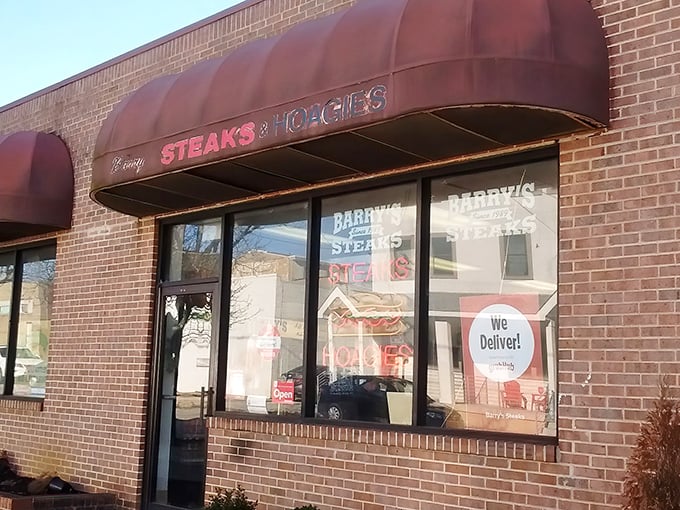 The pink awning of Barry's beckons like a beacon of hope to the cheesesteak-deprived, promising salvation in sandwich form on Ridge Avenue.