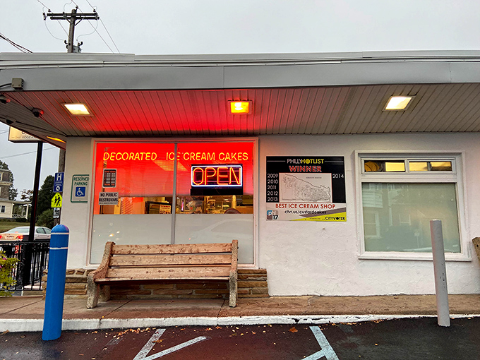 The neon glow of "OPEN" against a twilight sky—nature's way of saying it's officially ice cream o'clock in Philadelphia.