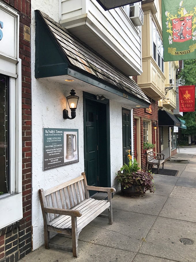 The unassuming exterior of McNally's Tavern hides culinary treasures within, like a speakeasy that forgot to keep the secret.