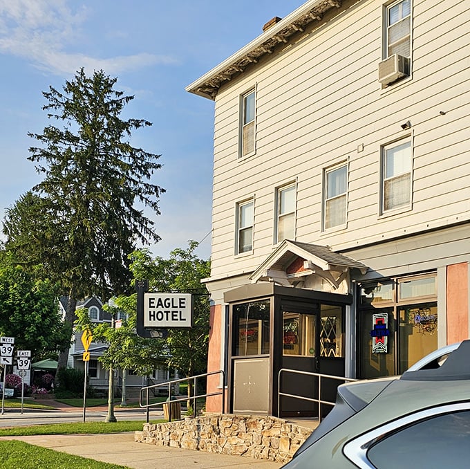 The unassuming exterior of Eagle Hotel stands like a culinary sentinel, promising treasures within that no flashy neon sign could adequately advertise.
