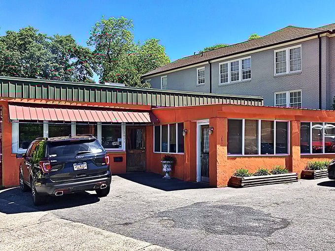 The unassuming orange exterior of Mediterranean Tea Room stands like a culinary lighthouse in Columbia, promising authentic flavors behind its modest façade.