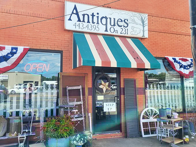 The brick-red facade with its candy-striped awning isn't just inviting—it's practically shouting "Come in and find your next conversation piece!"