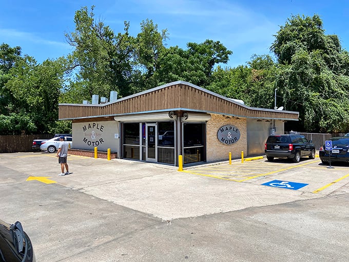 Dallas sunshine bathes this humble burger temple, where luxury cars and pickup trucks share parking spaces in the universal pursuit of great food.