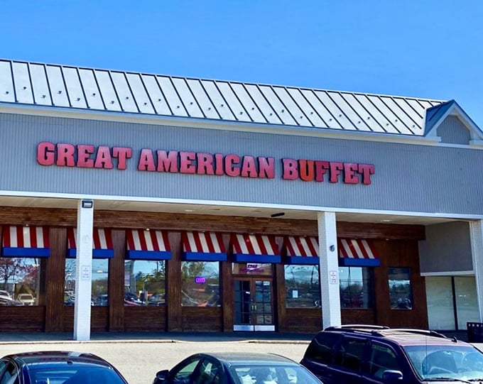 The red, white, and blue awnings aren't subtle about the patriotic theme—it's like Uncle Sam himself designed the storefront.