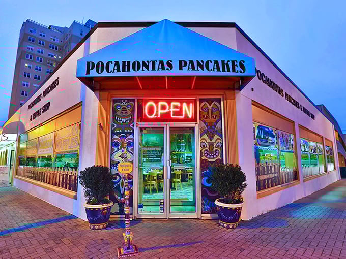 The blue-awninged beacon of breakfast bliss stands proudly on Virginia Beach's oceanfront, promising pancake paradise to early risers and brunch enthusiasts alike.