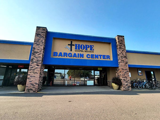 The bright blue facade of Hope Gospel Mission Bargain Center stands like a beacon for bargain hunters—Wisconsin's thrift paradise awaits behind those doors.