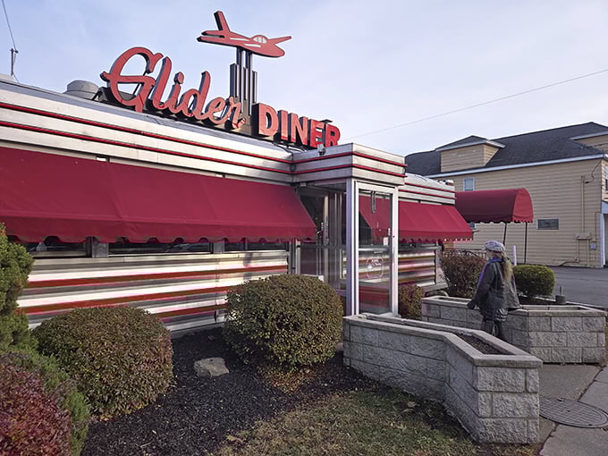 The iconic red exterior with its vintage airplane sign isn't just retro charm—it's a beacon calling hungry Scranton residents home.