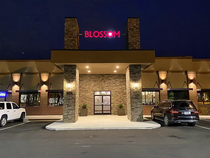 The glowing red Blossom sign beckons hungry travelers like a culinary lighthouse, promising delicious refuge from mundane meals.
