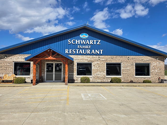 Under clear Indiana skies, Schwartz Family Restaurant's welcoming facade invites hungry travelers to discover what locals have known for years—breakfast nirvana awaits inside.