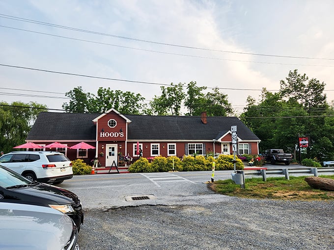 The unassuming red exterior of Hood's BBQ stands like a beacon of hope for hungry travelers. Barbecue paradise doesn't need fancy architecture to deliver on flavor promises.