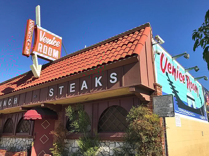 The neon sign beckons like a mid-century mirage. Venice Room's terra cotta roof and vintage façade promise a time-traveling steak adventure in Monterey Park.