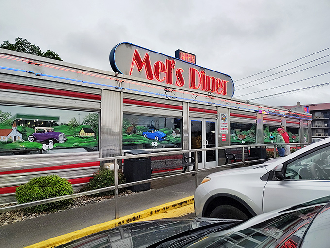 That iconic red neon sign promises more than just a meal—it's an invitation to step into a slice of Americana that's been perfected over decades.