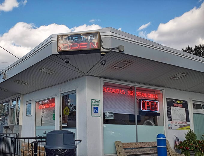 The neon glow of "OPEN" against a twilight sky—nature's way of saying it's officially ice cream o'clock in Philadelphia.