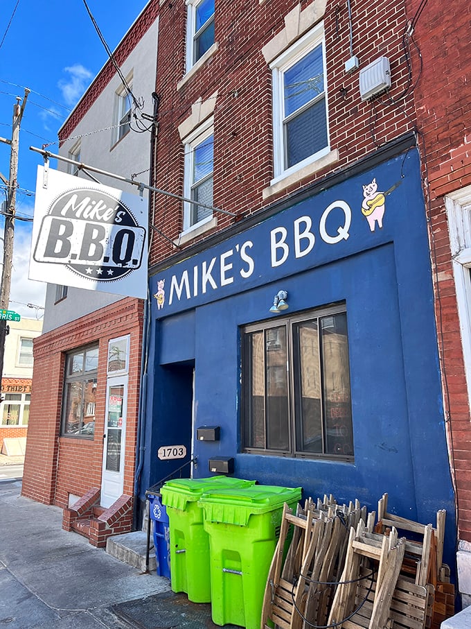 The blue storefront of Mike's BBQ stands like a beacon of smoky hope on East Passyunk Avenue, promising carnivorous delights within.