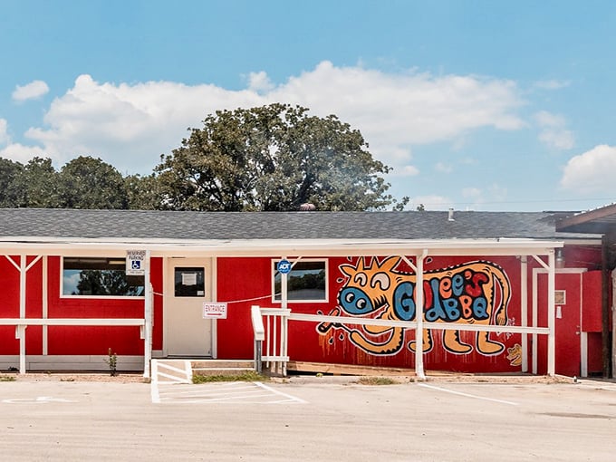 That colorful mural isn't just decoration – it's a beacon calling barbecue pilgrims home.