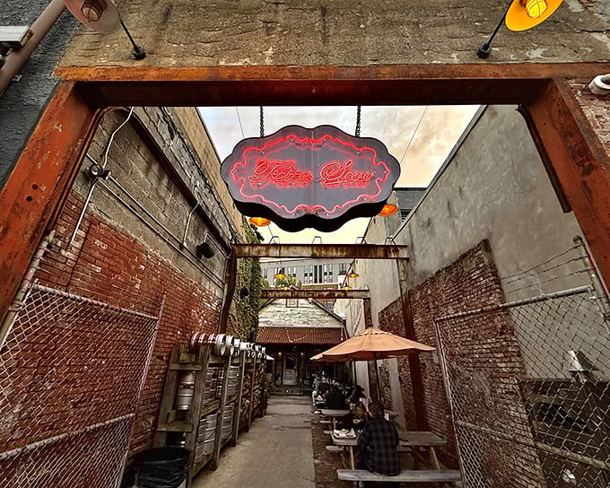 Rustic charm meets backyard hospitality with this weathered wooden porch entrance. The chalkboard sign might as well say "Abandon diets, all ye who enter here."