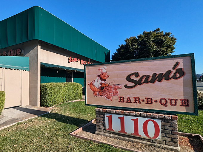 The unassuming green awning of Sam's Bar-B-Que beckons like a smoky siren call to barbecue lovers throughout San Jose.