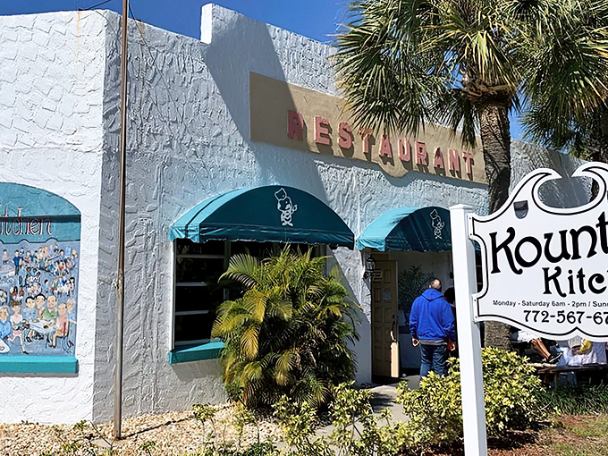 The unassuming white exterior with teal awnings is Florida's version of a treasure chest – modest on the outside, but filled with culinary gold within.