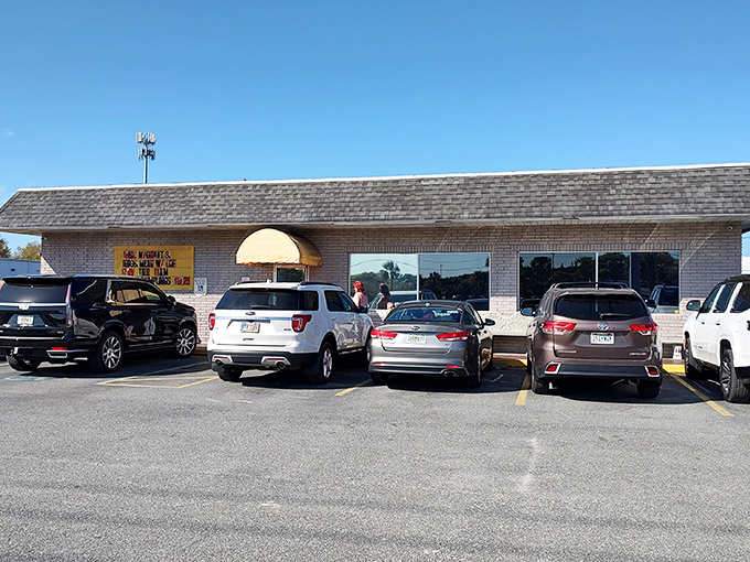 The unassuming brick exterior of Grannie's might not stop traffic, but the packed parking lot tells the real story—culinary treasures await inside.