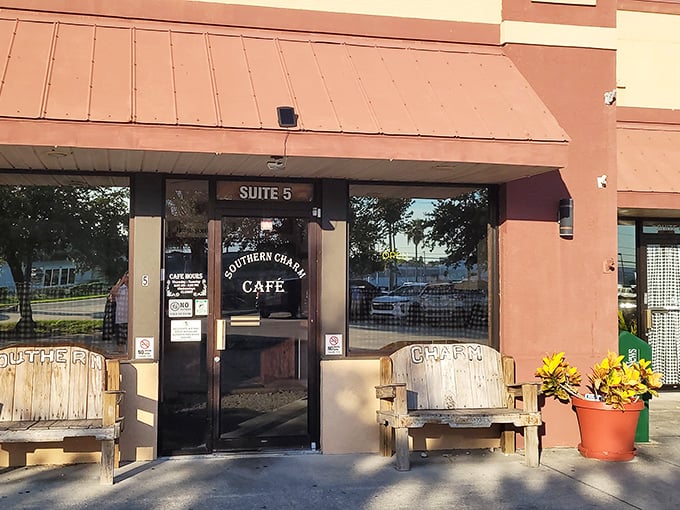 The unassuming entrance to flavor paradise – rustic wooden benches invite you to rest your feet while they prepare to blow your mind.