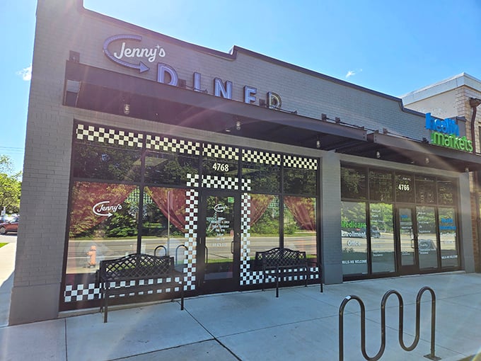 The iconic checkered pattern frames Jenny's storefront like a finish line flag, signaling you've arrived at your culinary destination.