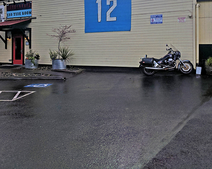 The Ebb Tide Room entrance welcomes early risers and night owls alike—even Seattle's rain can't keep motorcycle enthusiasts from their Benedict fix.