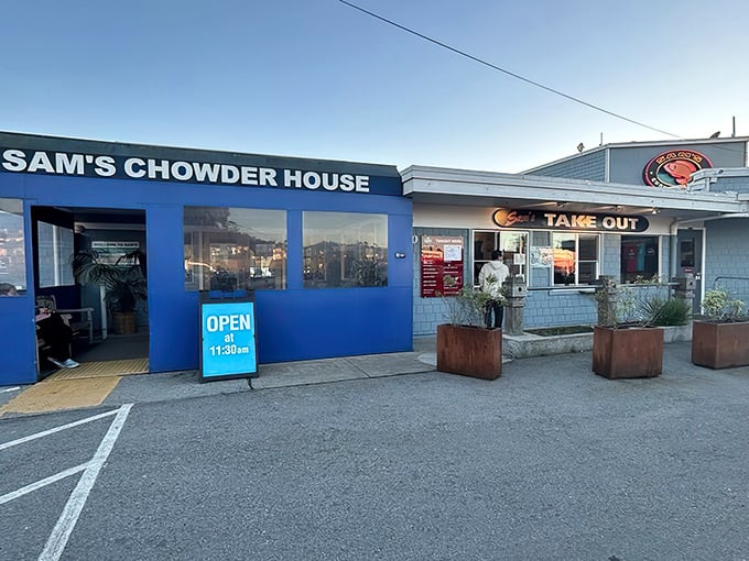 The blue facade of Sam's Chowder House stands like a beacon of seafood salvation on the Half Moon Bay coastline, promising oceanic delights within.
