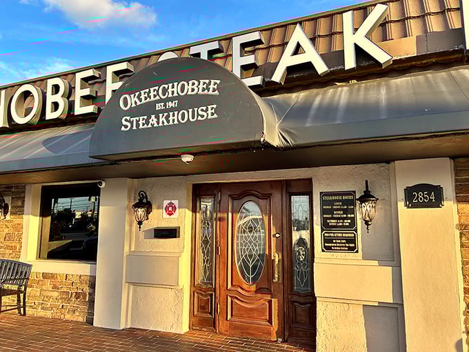 The unassuming brick façade of Okeechobee Steakhouse stands as a testament to the adage that true quality never needs flashy advertising.