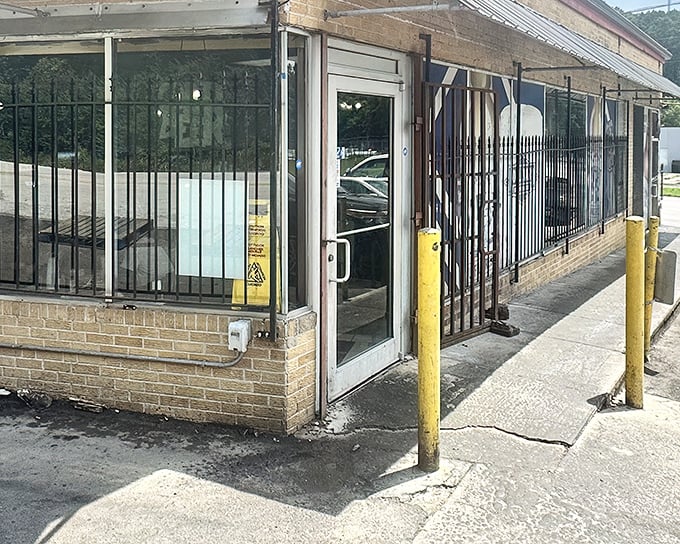 The unassuming entrance to LC's might not scream "barbecue royalty," but that smoky aroma wafting through those doors tells the real story.