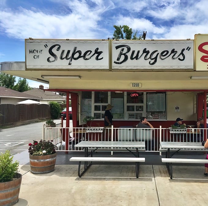 The iconic "Super Burgers" sign promises exactly what you'll get—a time capsule of American drive-in culture where simplicity reigns supreme.