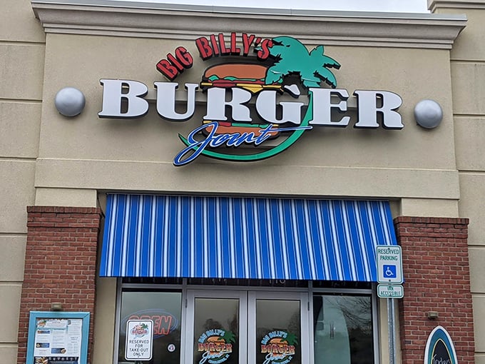 The iconic Big Billy's sign promises paradise with every burger – that palm tree isn't just decoration, it's a lifestyle statement.