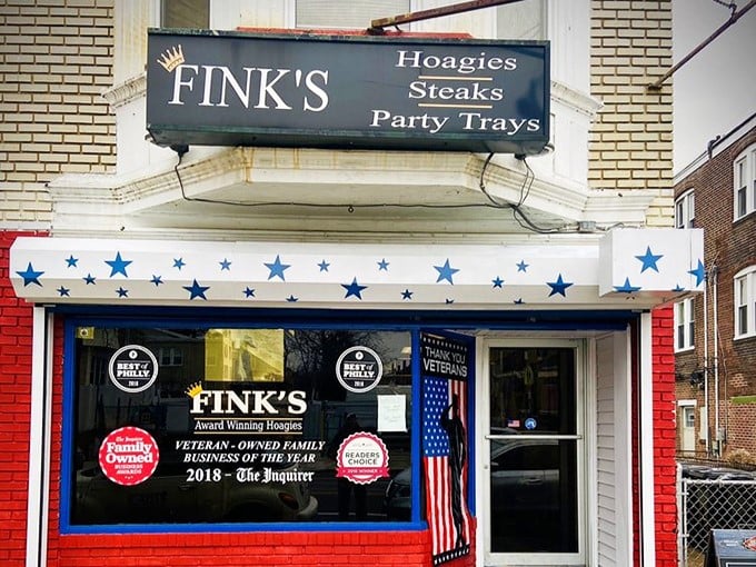 The unassuming storefront with its patriotic blue-starred awning stands like a sandwich sentinel in Northeast Philly. Awards proudly displayed hint at the treasures within.