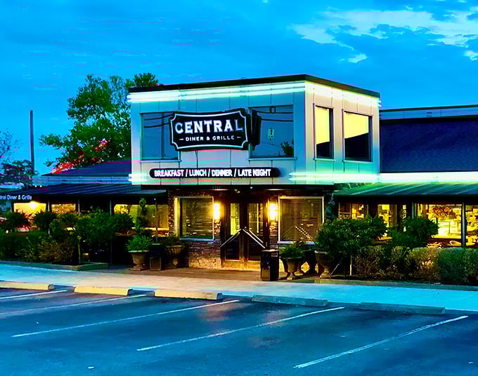 The blue-hour glow transforms this unassuming diner into a beacon of culinary promise. Like finding a Rolex in your cereal box—unexpected treasure awaits inside.