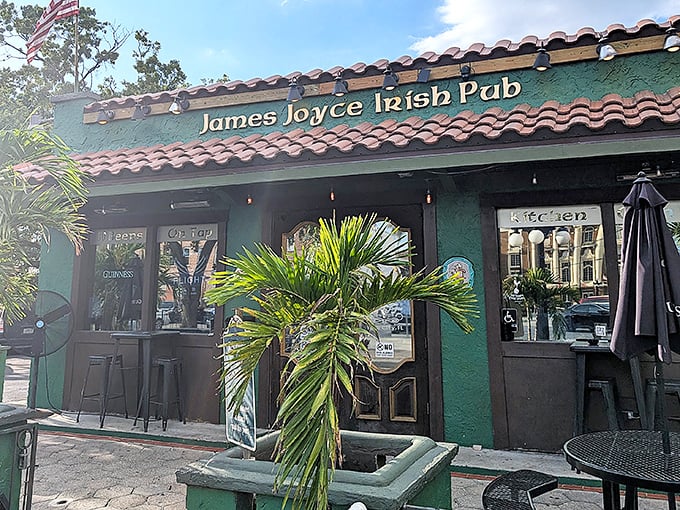 The emerald facade of James Joyce Irish Pub welcomes visitors with sun-shimmering exterior details—where Ireland meets Florida in this cultural crossroads.