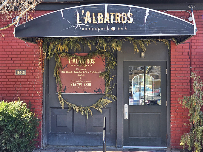 The unassuming brick façade of L'Albatros hides culinary treasures within, like finding a Renoir in your grandma's attic.
