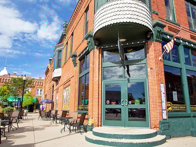 That iconic red dome isn't just architectural eye candy—it's Stevens Point's beacon for hungry travelers seeking refuge from ordinary dining.