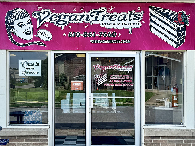 The unassuming storefront with its vibrant pink sign beckons dessert lovers like a siren call to sailors. Sweet paradise awaits inside!