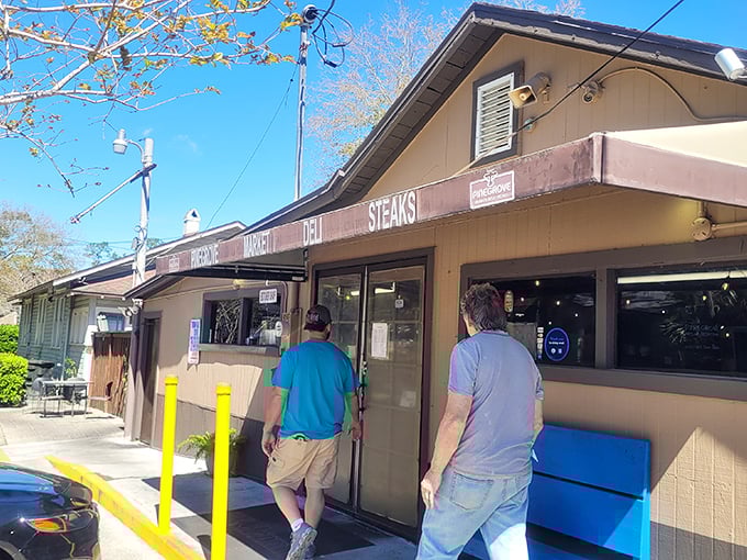 Don't let the humble exterior fool you—this unassuming building houses sandwich artistry that would make Michelangelo put down his paintbrush and pick up a fork.