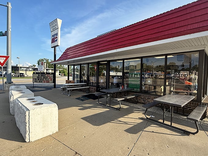 The stoplight isn't just directing traffic—it's guiding hungry souls to this unassuming temple of comfort food classics.
