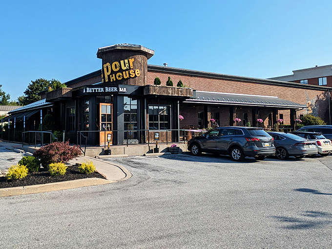 The octagonal entrance of The Pour House stands like a beacon for beer lovers and oyster enthusiasts alike, promising delicious discoveries within its wooden-framed walls.