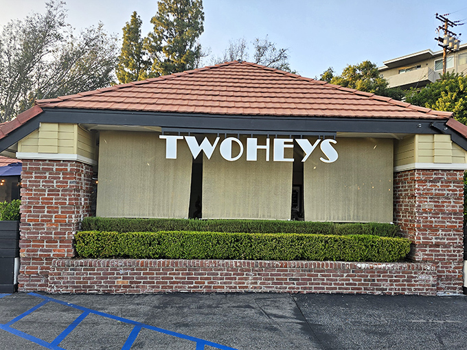 The iconic Twohey's exterior welcomes hungry patrons with its classic brick façade and mid-century charm – a culinary time machine waiting to transport you.