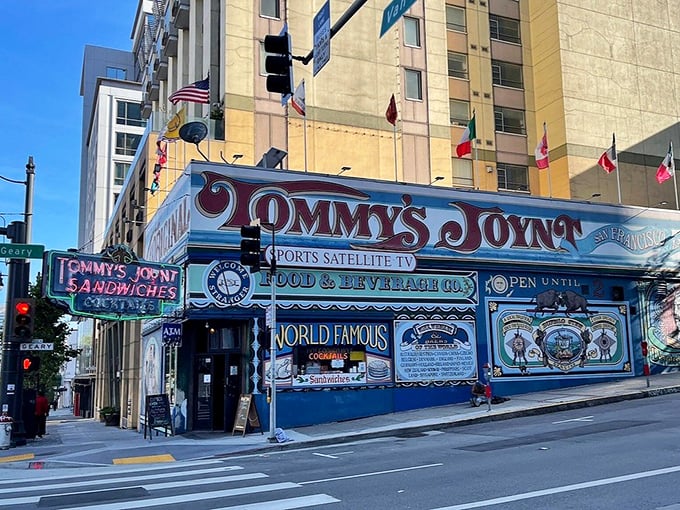 Tommy's Joynt stands out on Van Ness Avenue like a carnival barker in a library—loud, proud, and impossible to ignore with its vibrant hand-painted exterior.