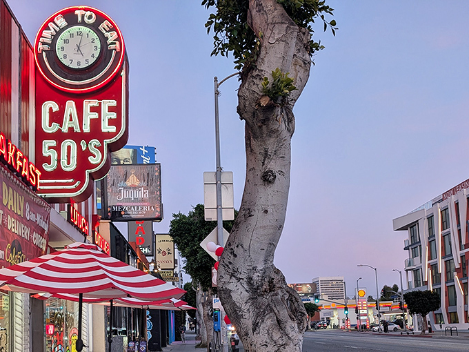 That iconic neon sign beckons like a time machine on wheels. "Time to Eat" indeed—the clock's always right when it's pointing to comfort food o'clock.