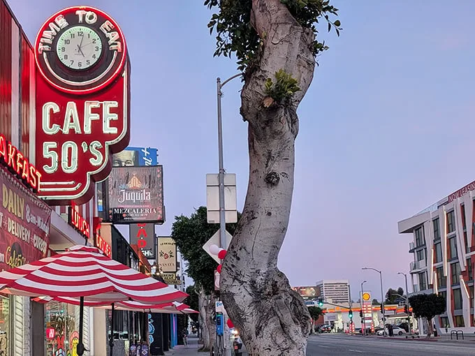 That iconic neon sign beckons like a time machine on wheels. "Time to Eat" indeed—the clock's always right when it's pointing to comfort food o'clock.